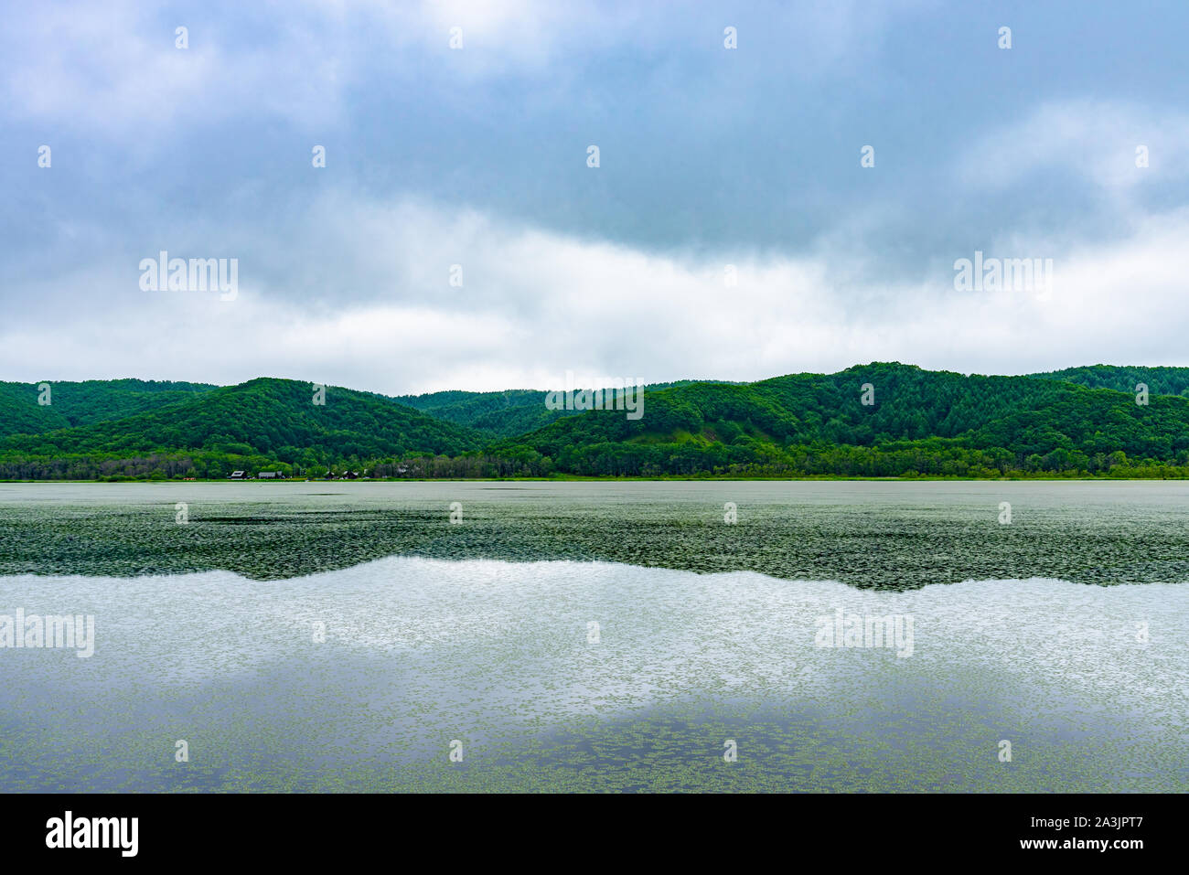 Lake Takkobu in summer cloudy day. It is the smallest freshwater lake ...