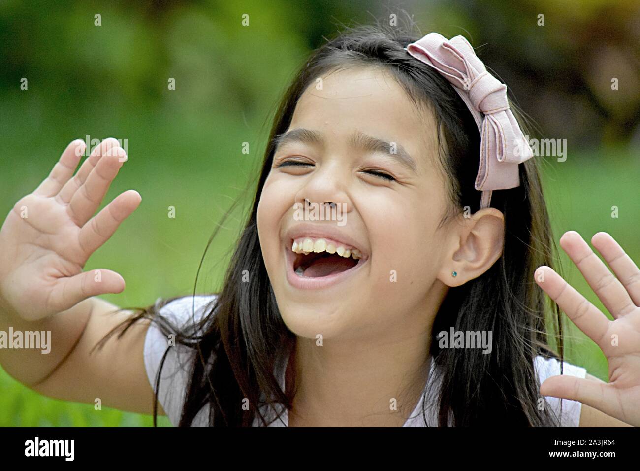 A Filipina Girl Child And Happiness Stock Photo - Alamy