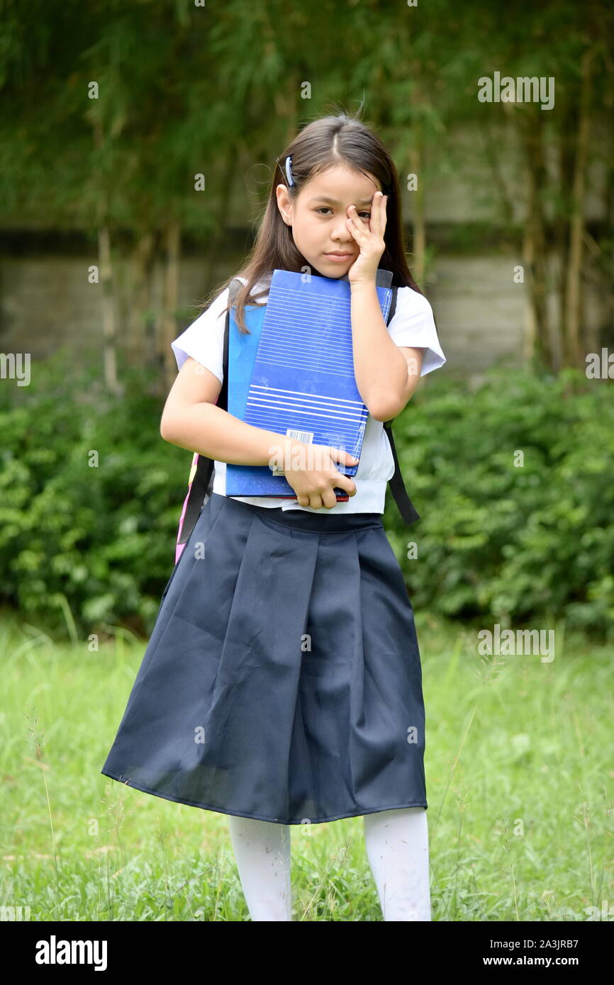 A Child Girl Student And Shyness Stock Photo - Alamy