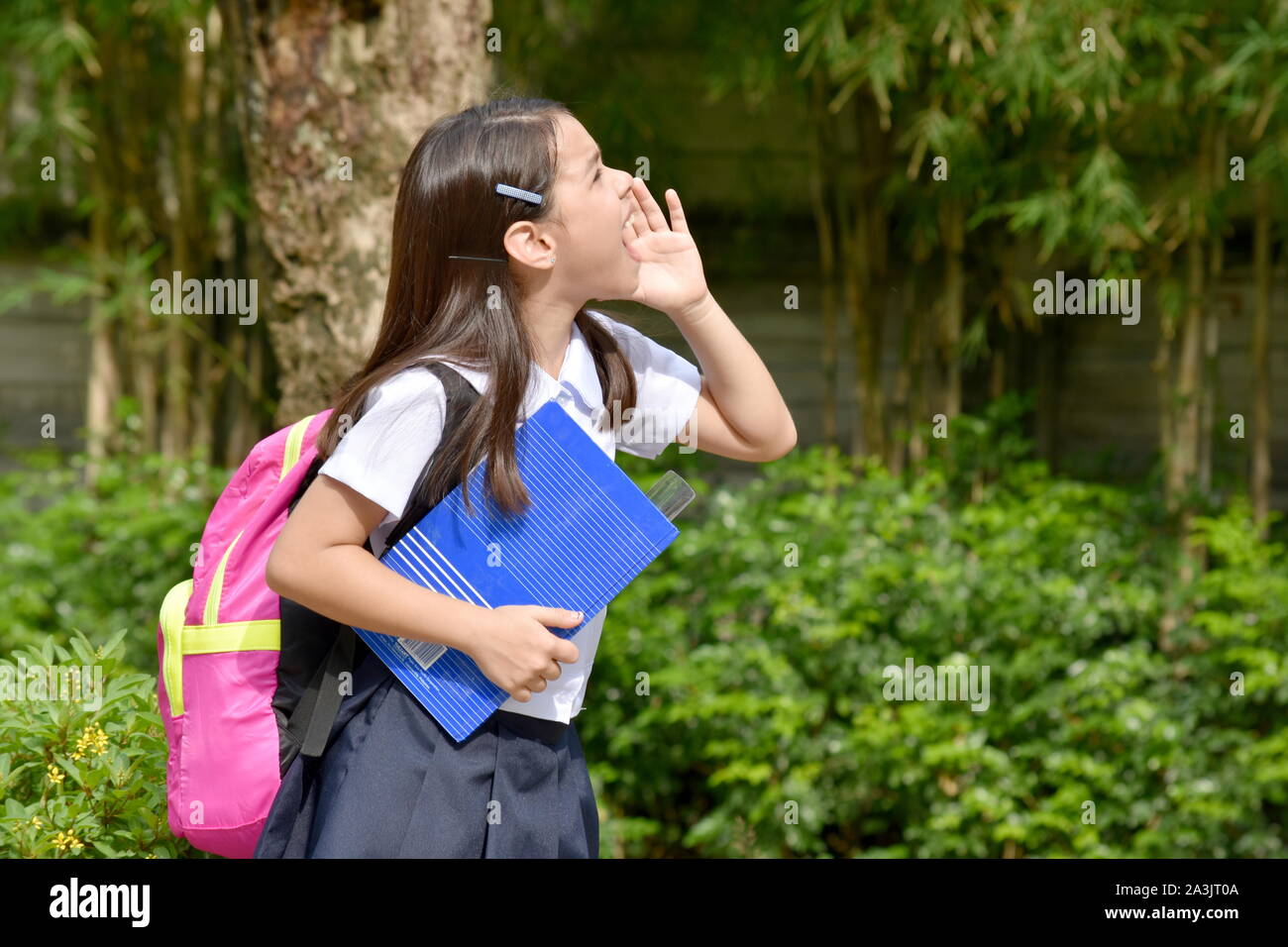 A Cute Diverse Girl Student Shouting Stock Photo - Alamy