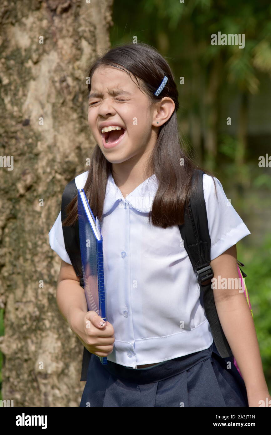 Stressful Girl Student Wearing School Uniform Stock Photo - Alamy