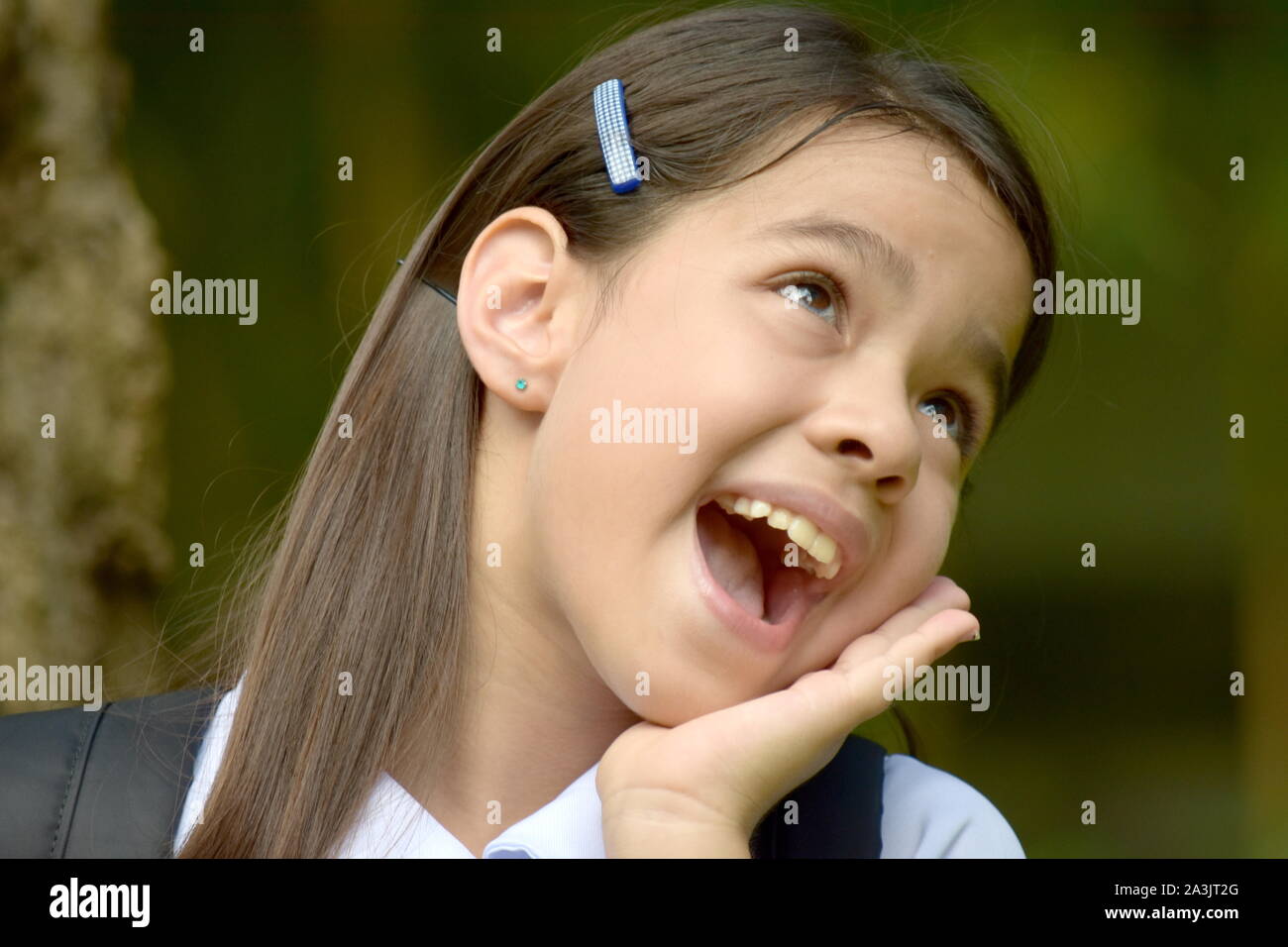 Surprised Young Female Student School Girl With Books Stock Photo - Alamy