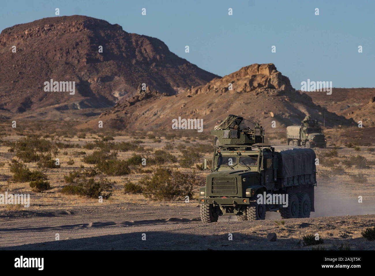 U.S. Marines with Combat Logistics Battalion (CLB) 8 drive a medium ...