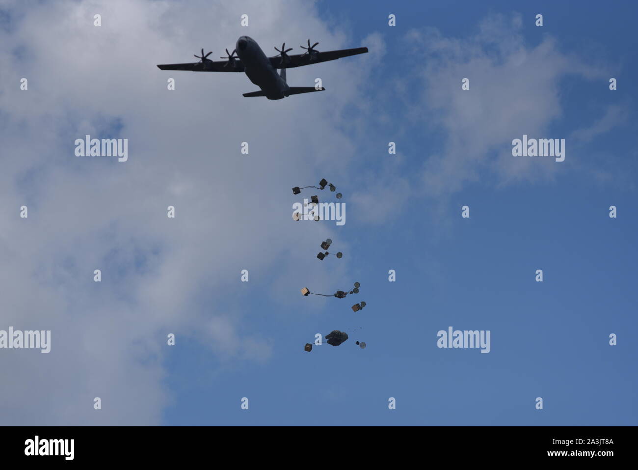 The 815th Airlift Squadron completes an airdrop of container delivery ...