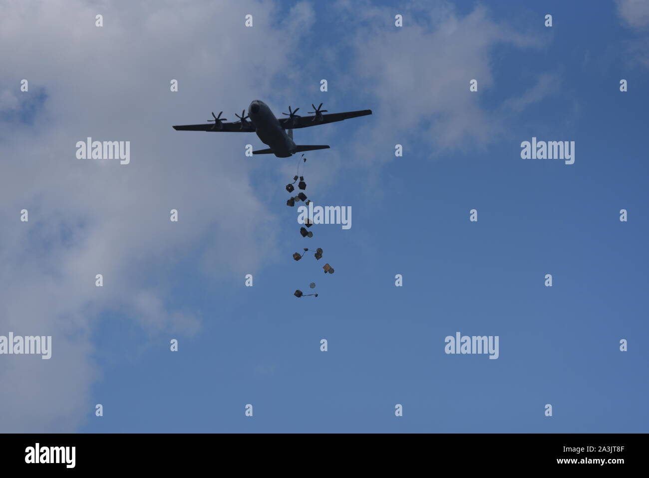 The 815th Airlift Squadron completes an airdrop of container delivery ...