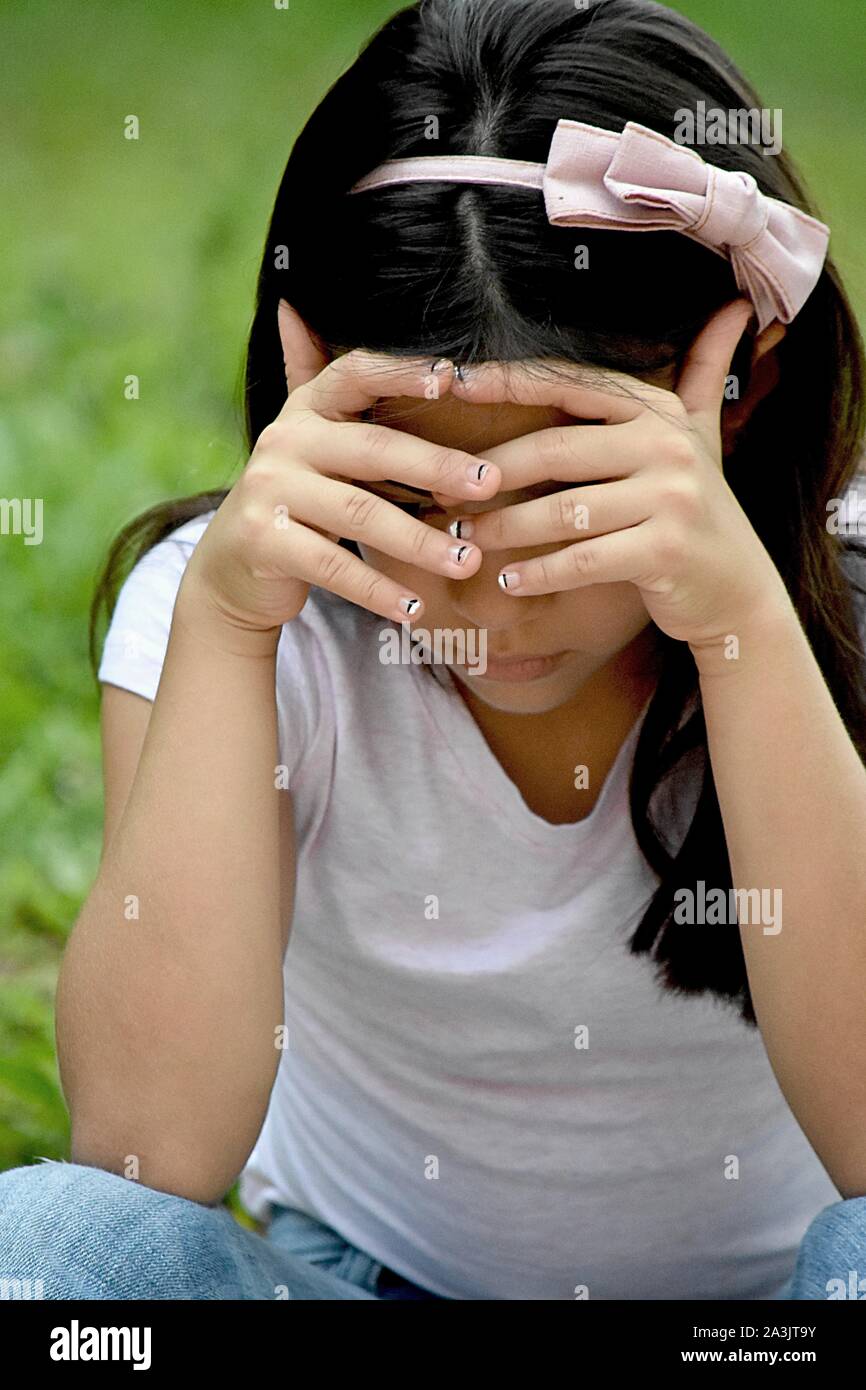 A Sad Petite Filipina Girl Stock Photo - Alamy