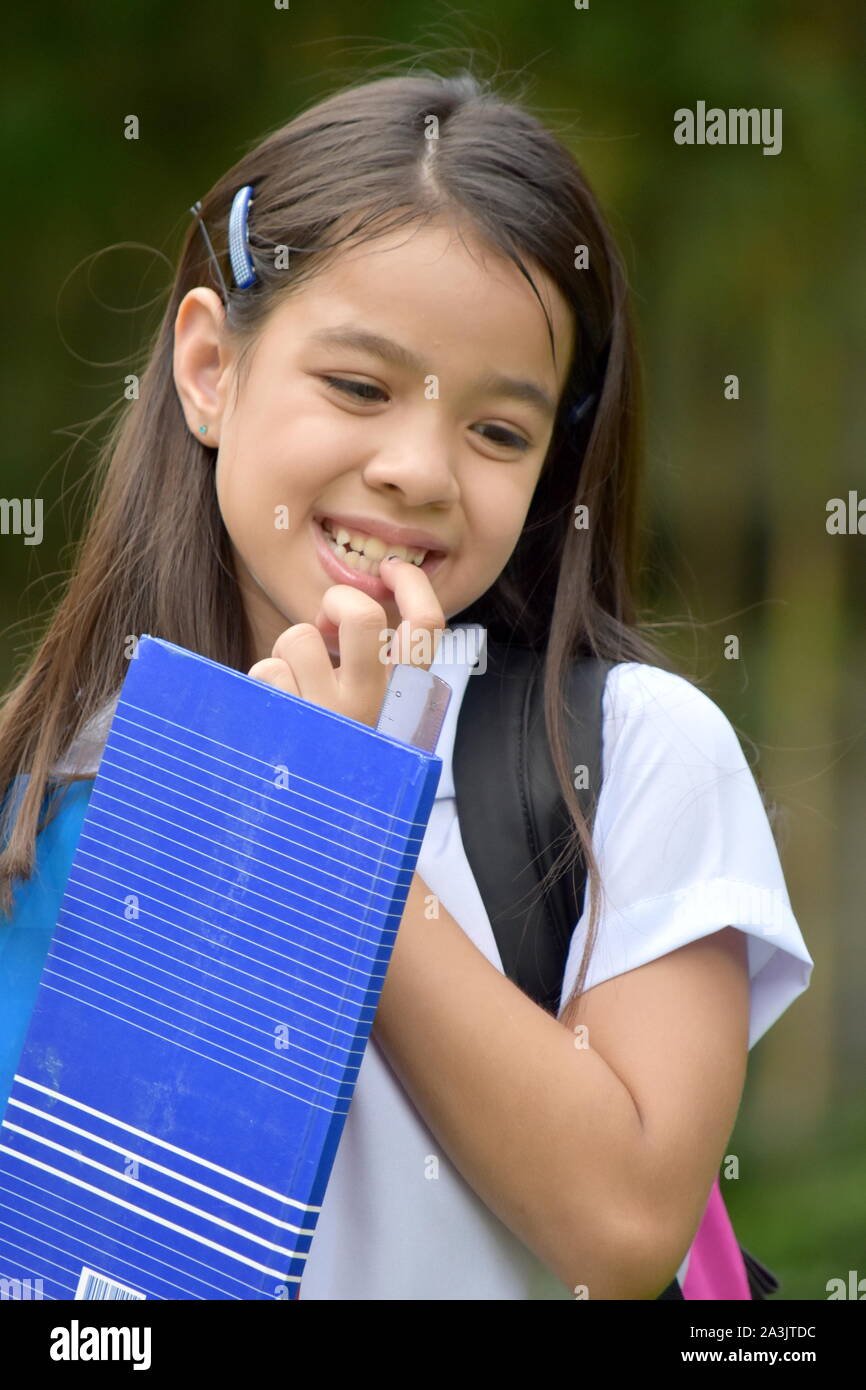 A Female Student And Shyness Stock Photo - Alamy