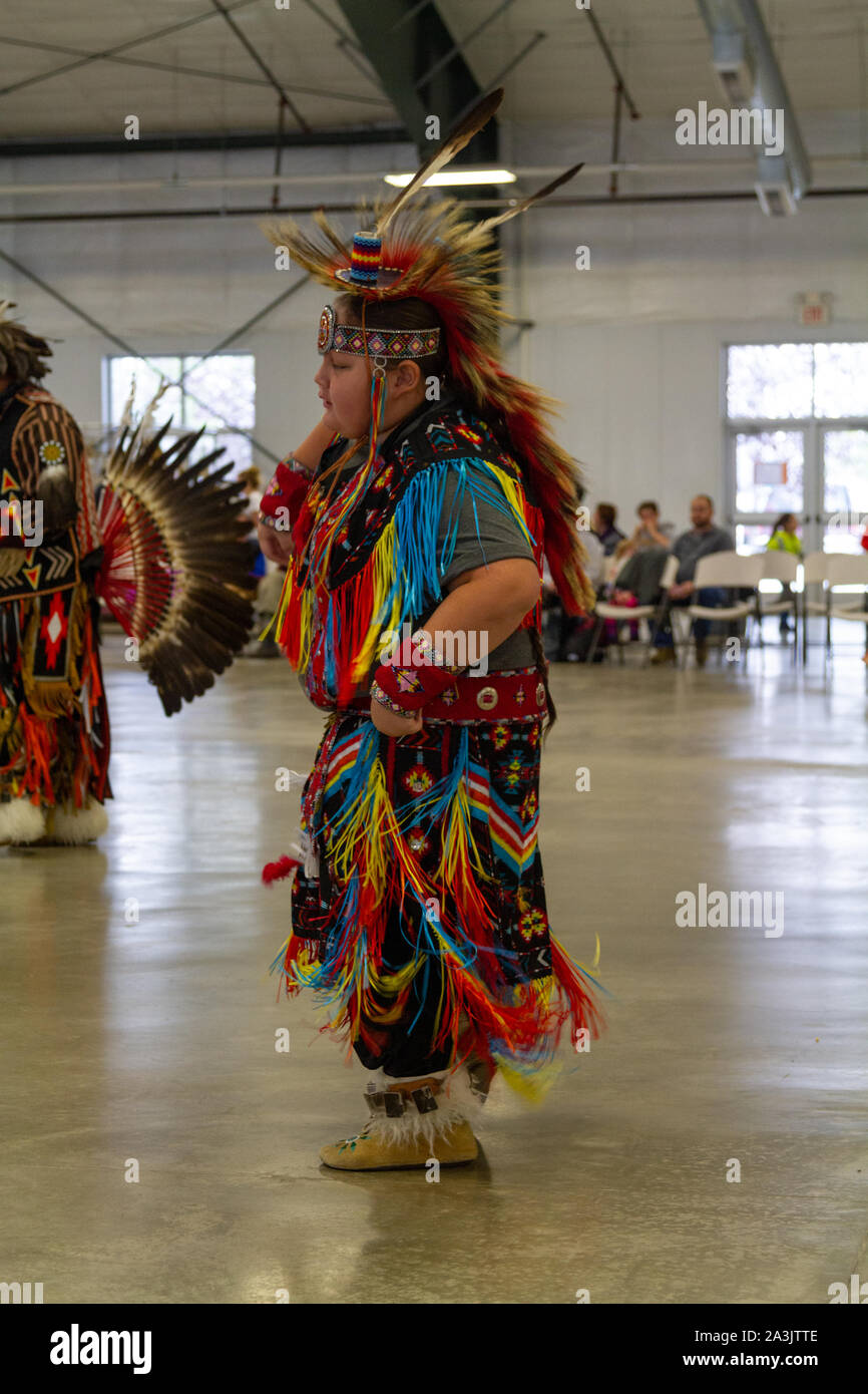 Young Native American dancer dancing in regalia at a Pow Wow where ...