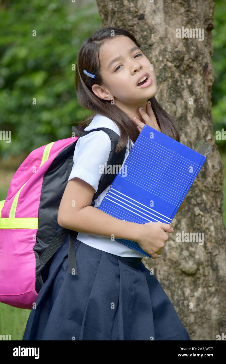 Child at school unhappy hi-res stock photography and images - Alamy