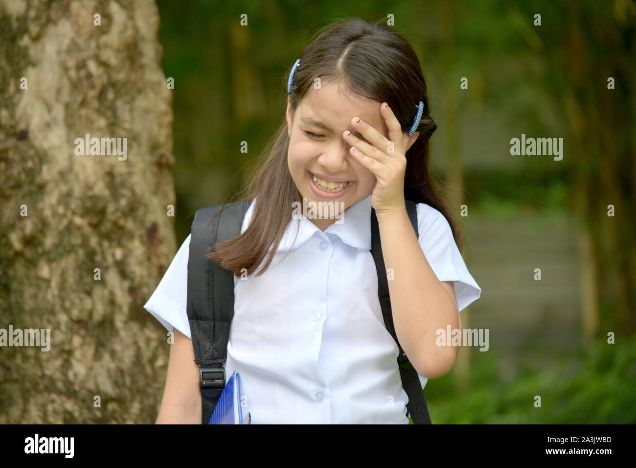 Crying Prep Asian Female Student Wearing School Uniform Stock Photo - Alamy