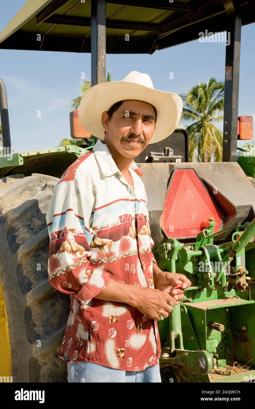 Portrait of male farmer working the field, with a strong look, work day ...
