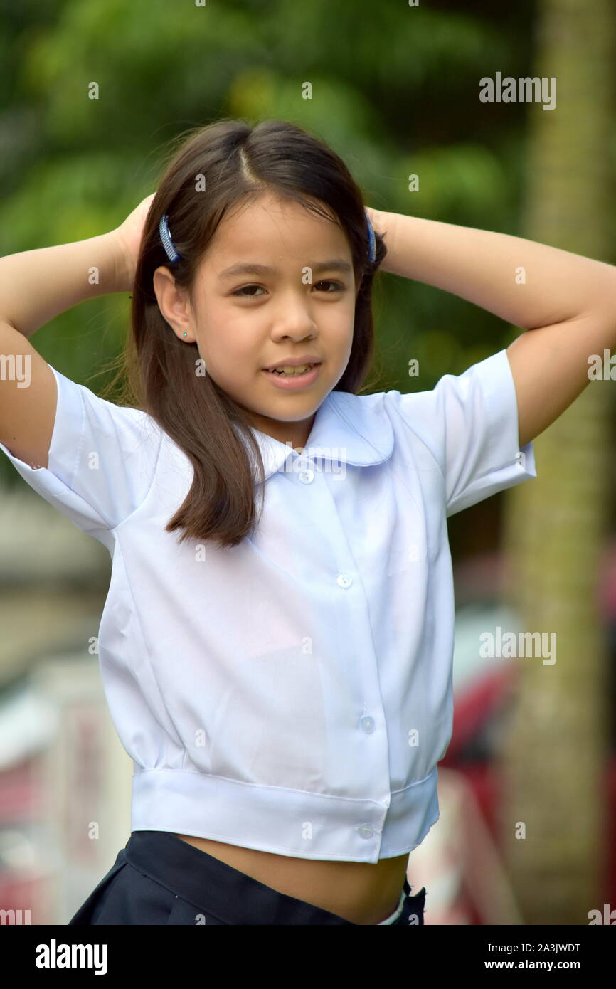 A Cute Filipina Girl Relaxing Stock Photo - Alamy