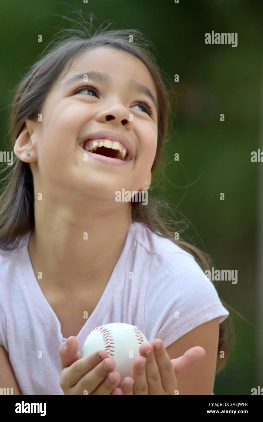 Diverse Female Baseball Player Laughing With Baseball Stock Photo - Alamy