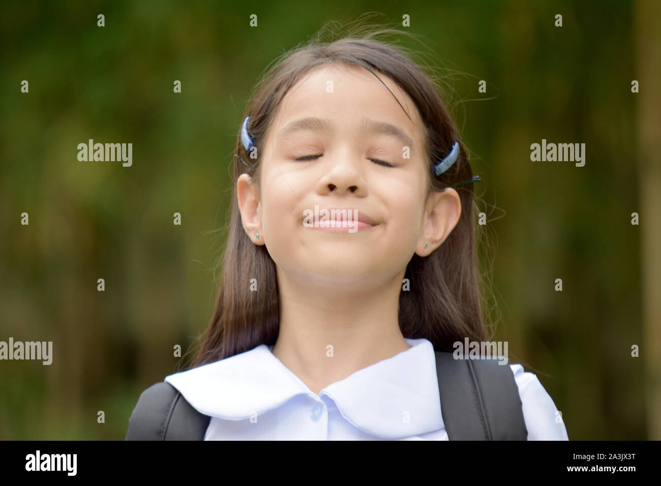 Girl Student With Eyes Closed With Notebooks Stock Photo - Alamy