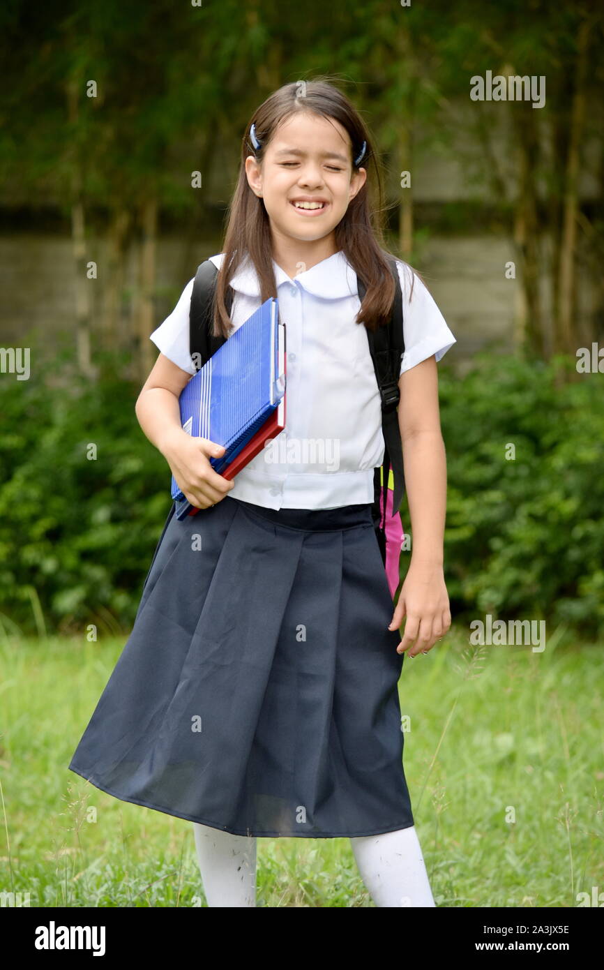 Asian Child Girl Student Under Stress With Notebooks Stock Photo - Alamy