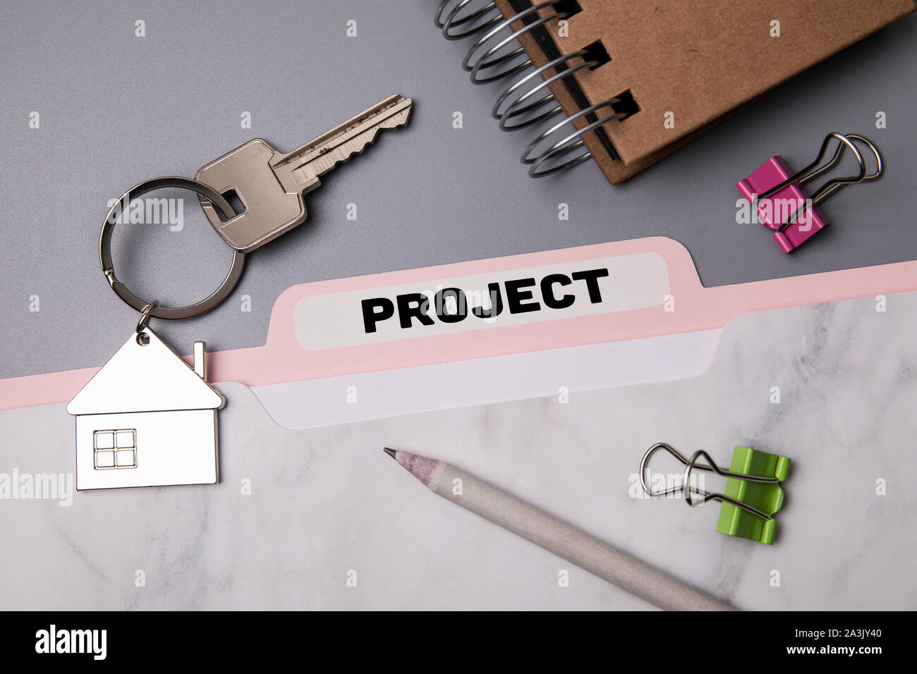 Project. File folder, stationery and home keys on the office desk Stock ...