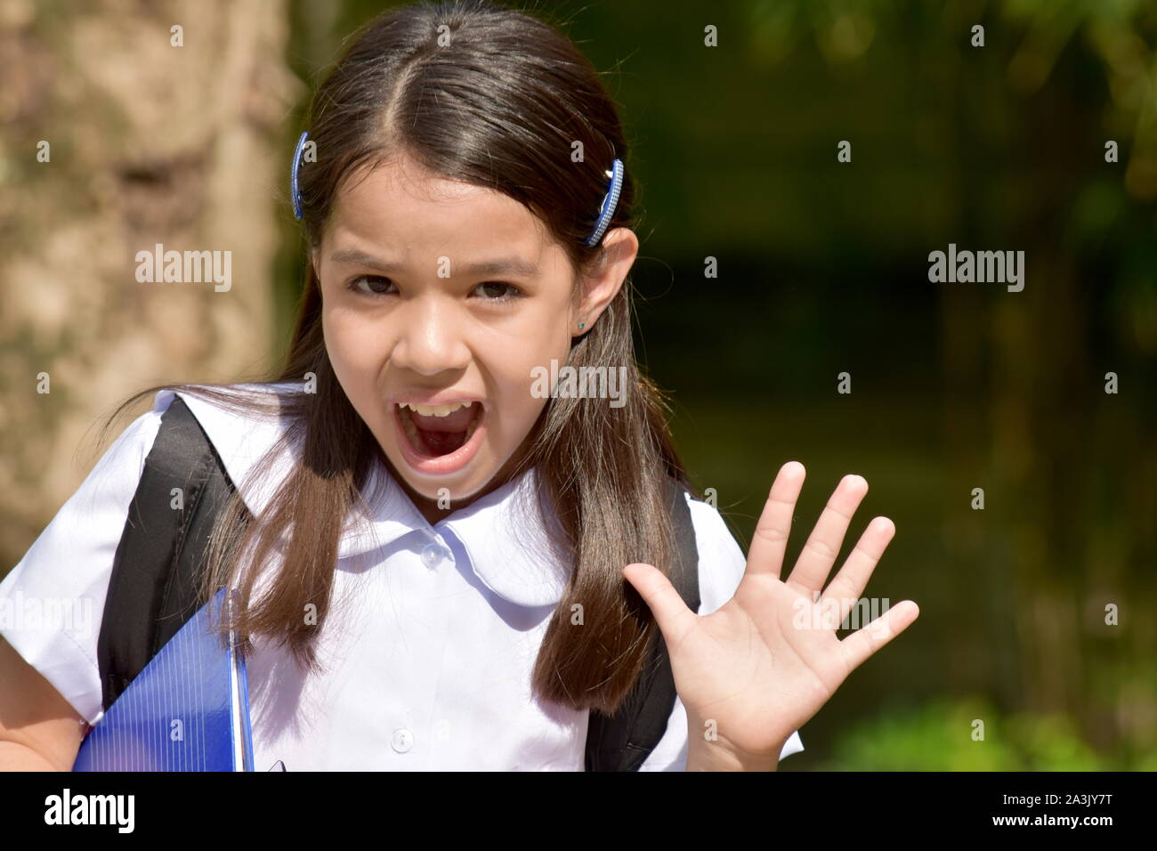 Surprised Catholic Asian Female Student School Girl Stock Photo - Alamy