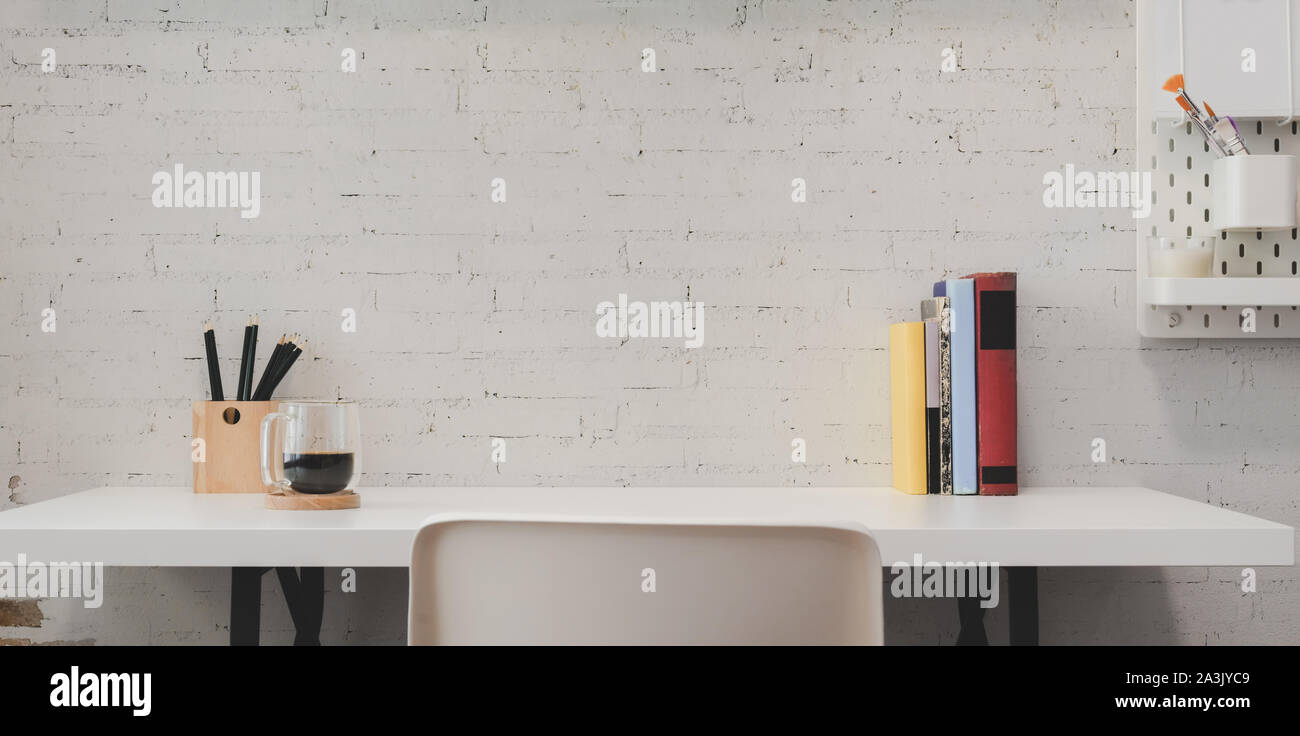 Minimal home-office with office supplies and decorations on white ...