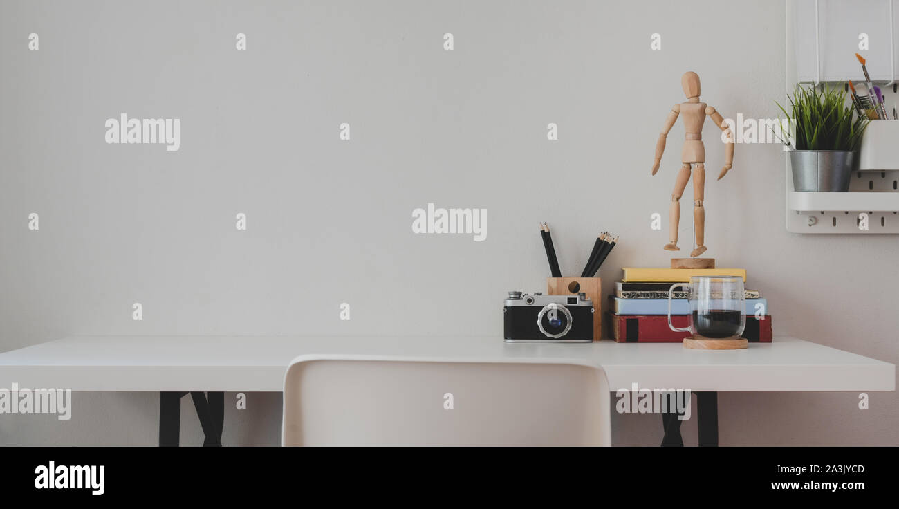 Minimal home-office with office supplies and decorations on white ...