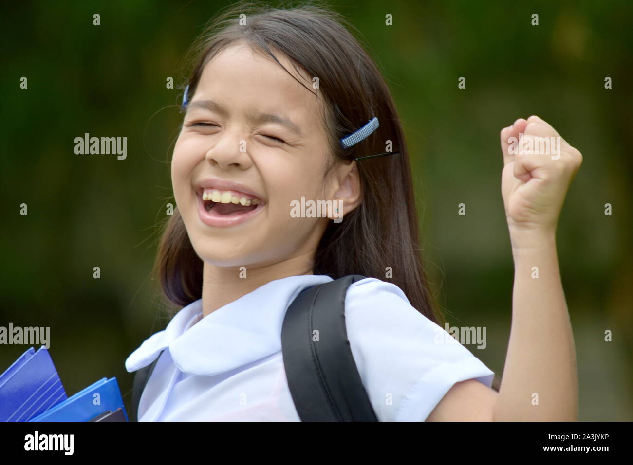 A Proud Catholic Person With Books Stock Photo - Alamy