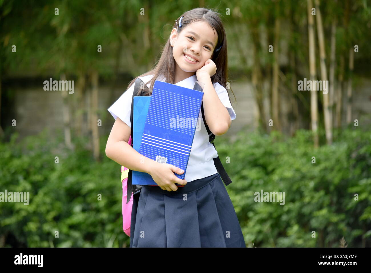 A Happy Pretty School Girl Stock Photo - Alamy