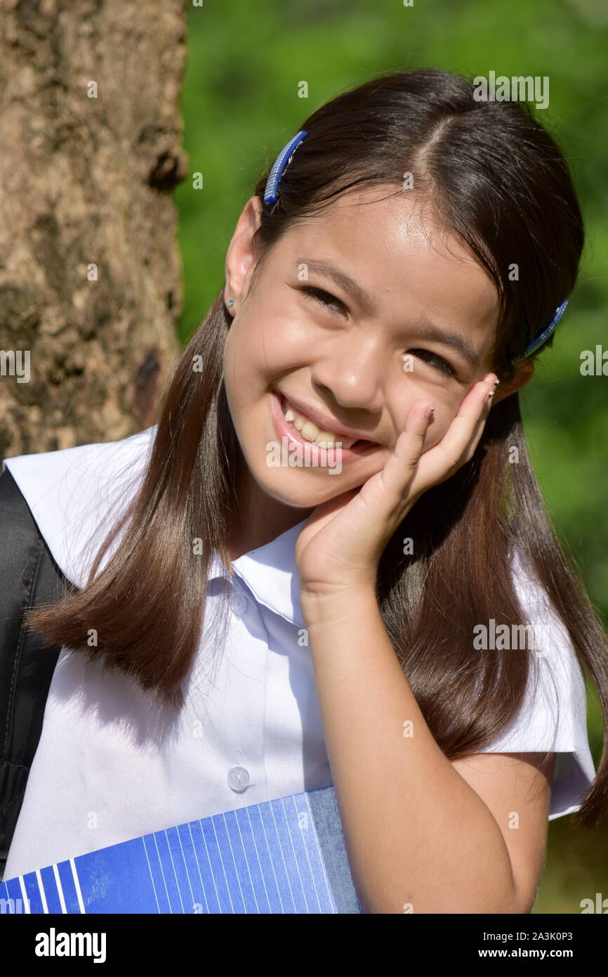 Pretty Asian Girl Student Wondering Wearing School Uniform With Books ...