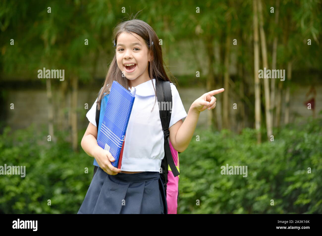 Pointing Young Minority Child Girl Student Wearing School Uniform Stock ...