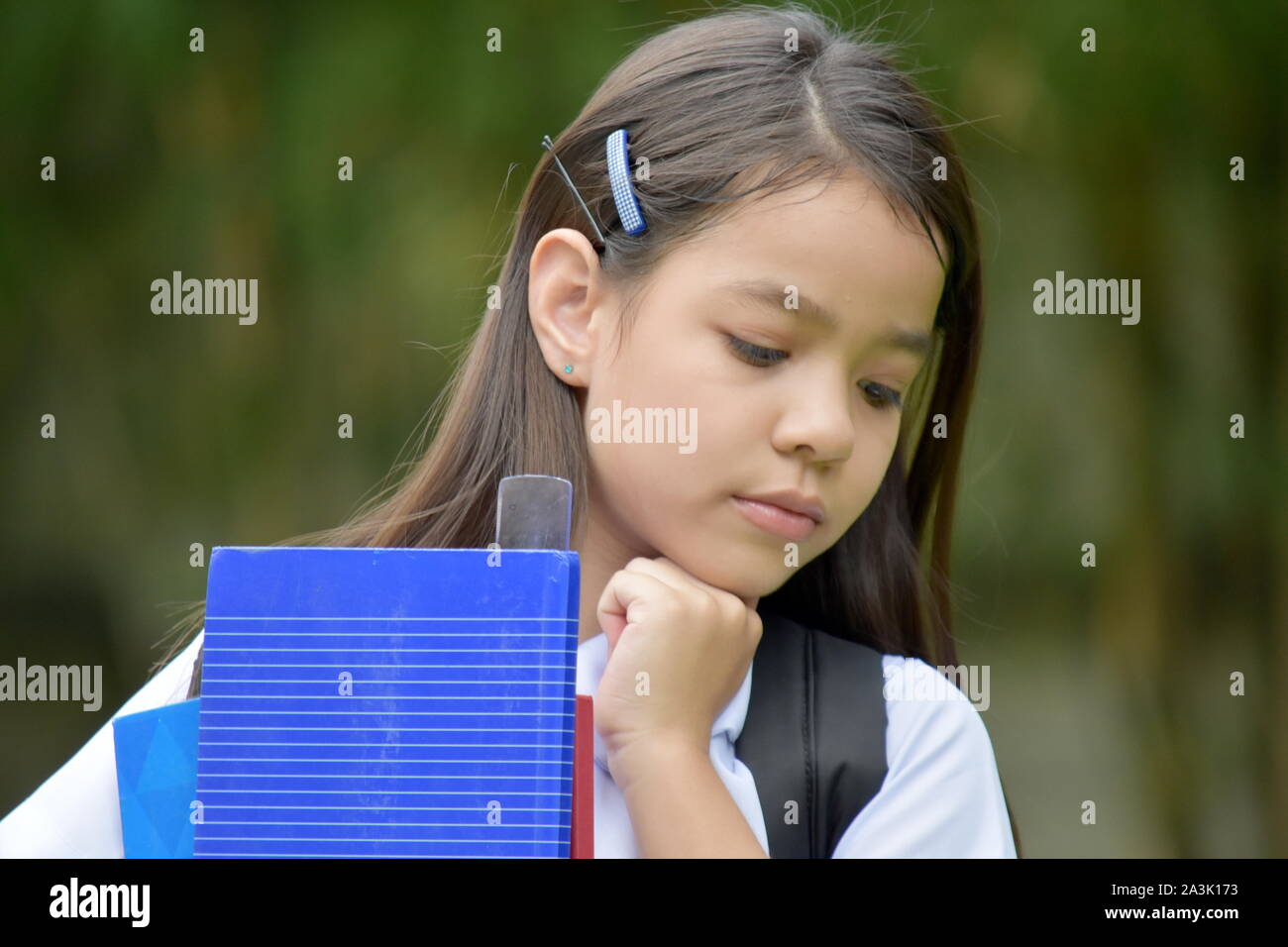 Young Asian Female Student Thinking With Notebooks Stock Photo - Alamy