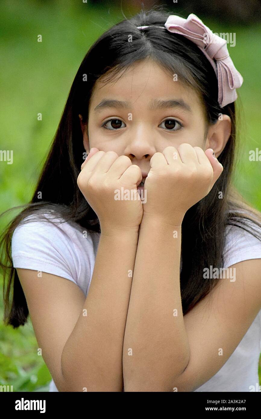 Asian girl child fearful hi-res stock photography and images - Alamy