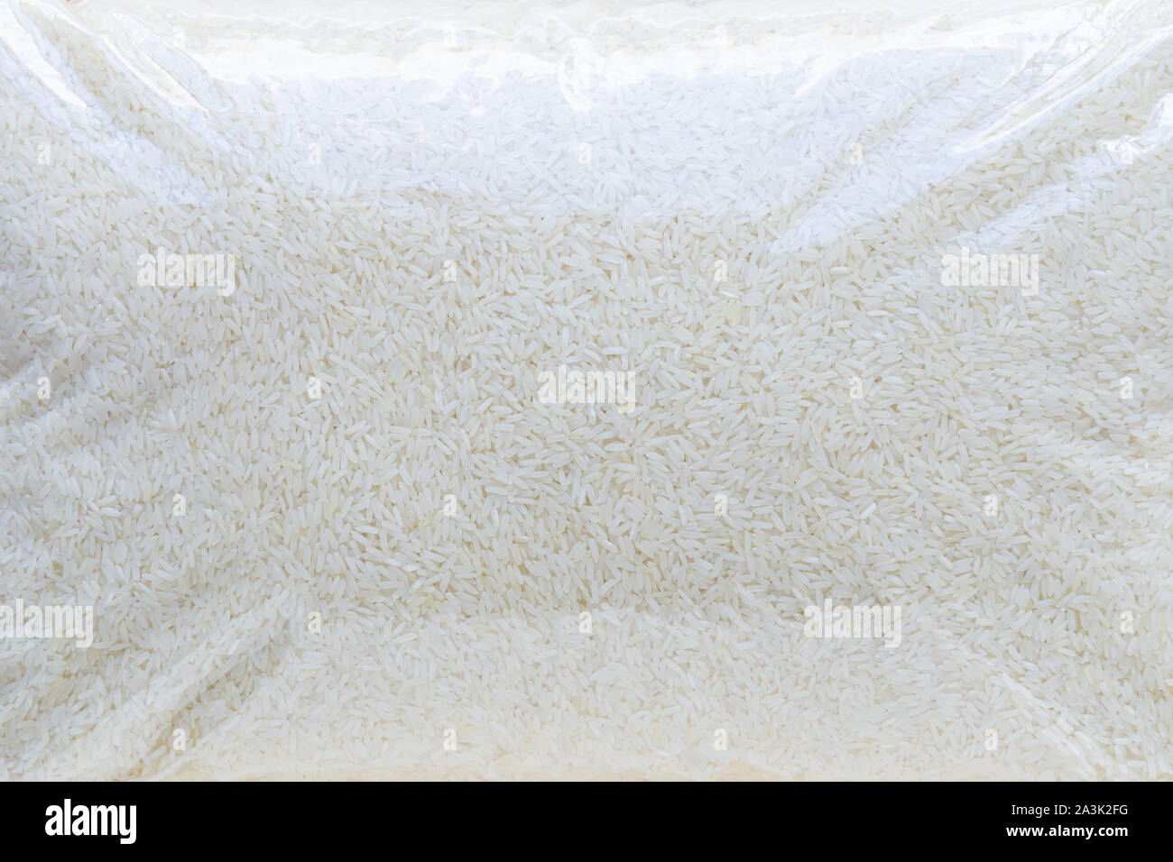 Rice in a clear plastic bag Stock Photo - Alamy