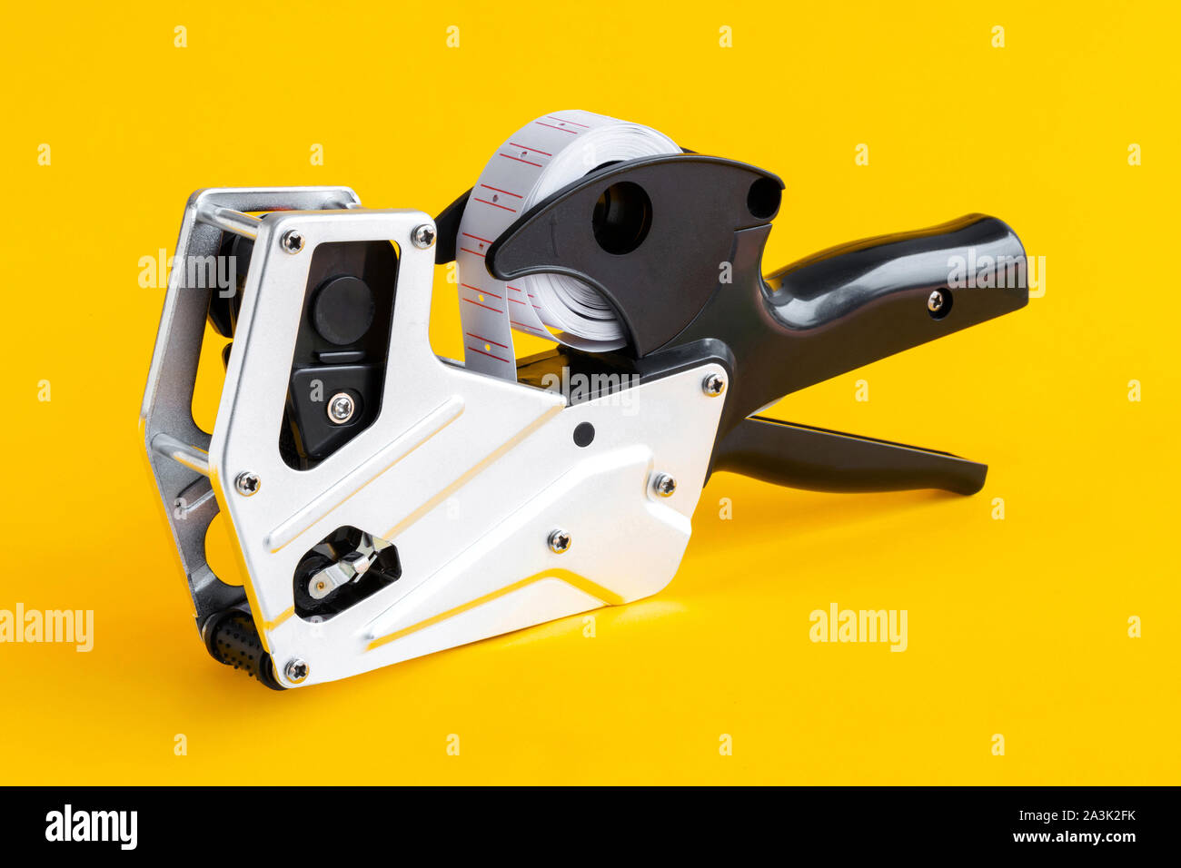 Sticker machine Price Isolated on a yellow background Stock Photo - Alamy