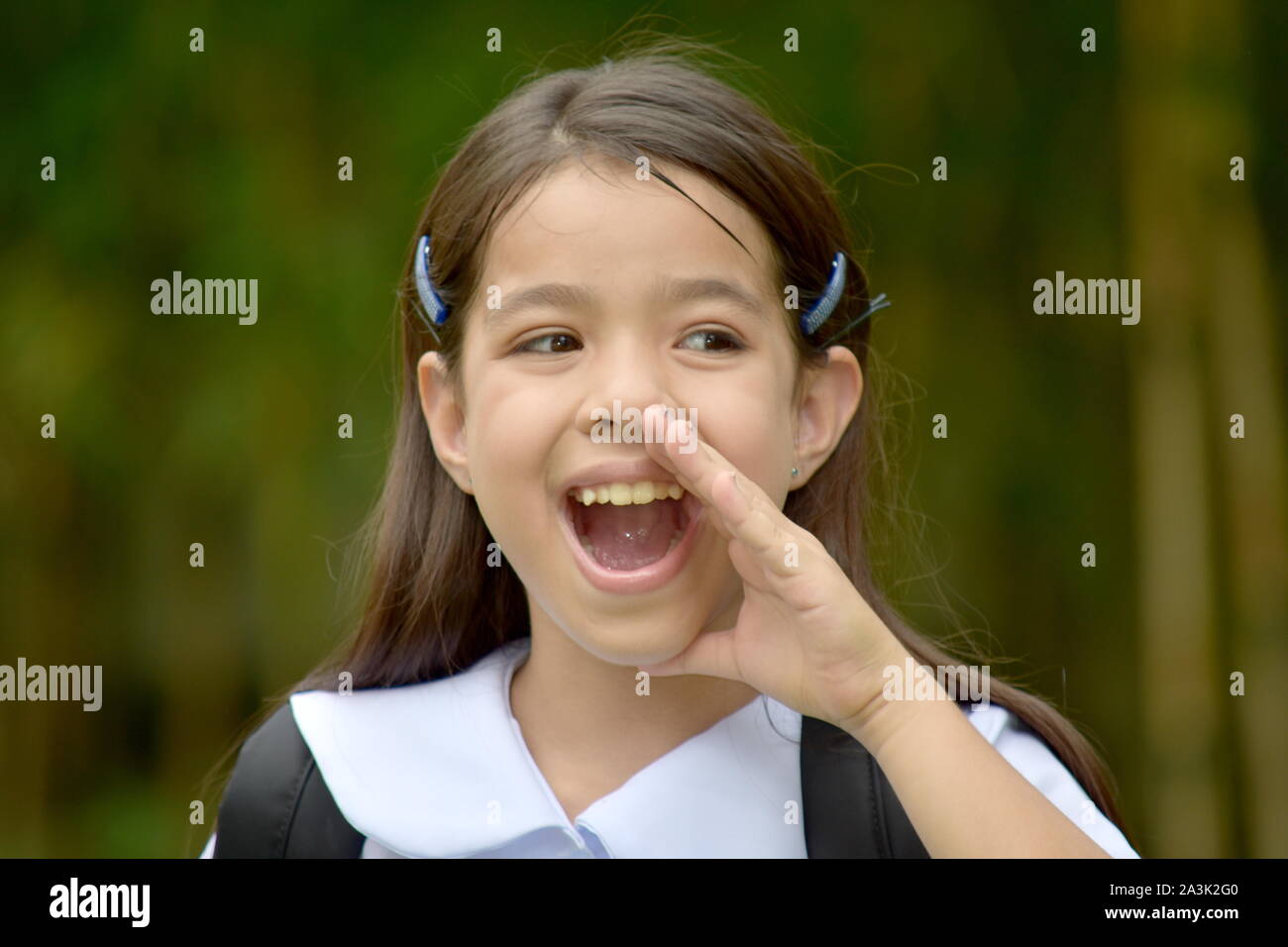 Talking Young Asian Female Student Wearing Uniform Stock Photo - Alamy