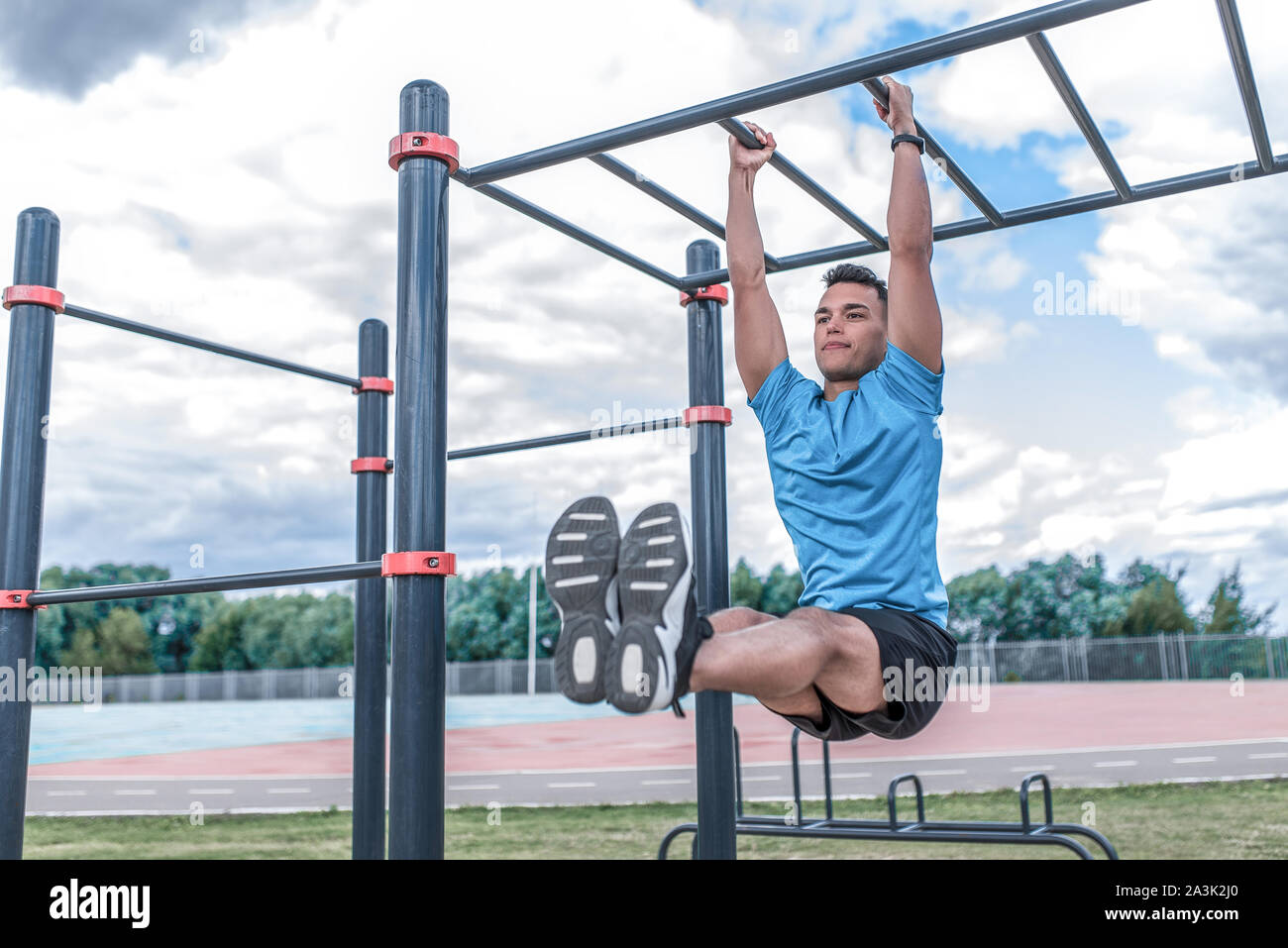 Male athlete, training abdominal muscles, exercise on press, raising ...