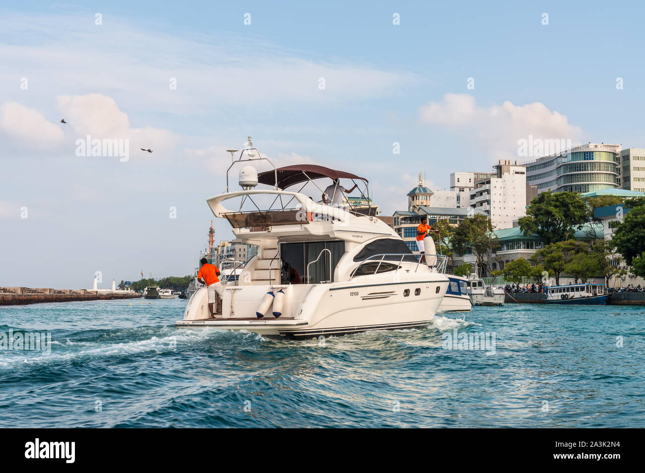 Male, Maldives - November 17, 2017: Speed boat docking to pick up ...