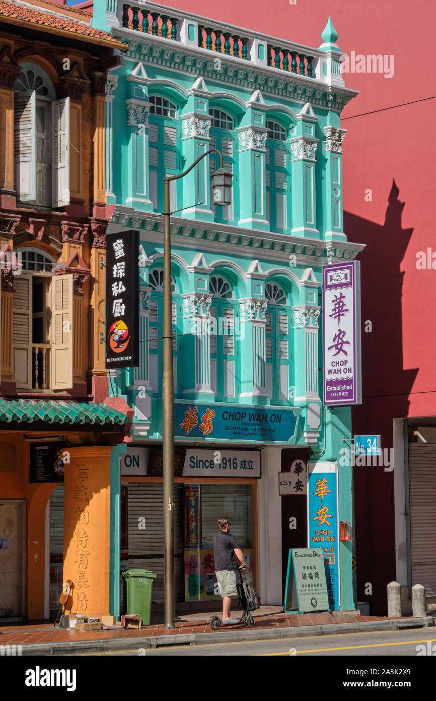 Traditional colorful shophouses in Upper Cross Street in Chinatown ...