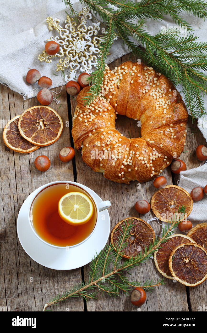 Christmas cake with tea with lemon Stock Photo - Alamy