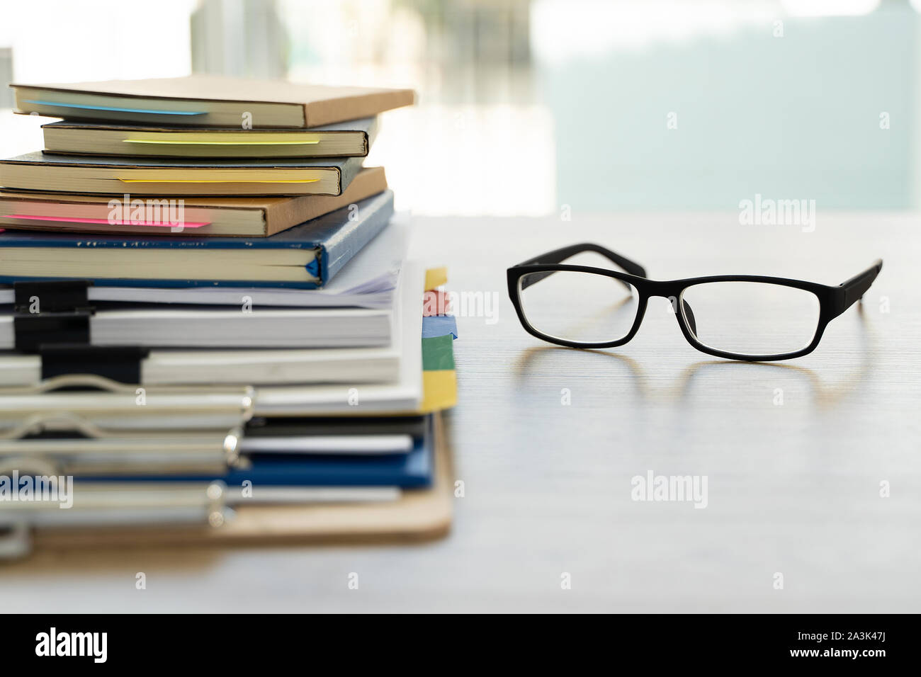 business man Office employee working contract with documents Stacks of ...