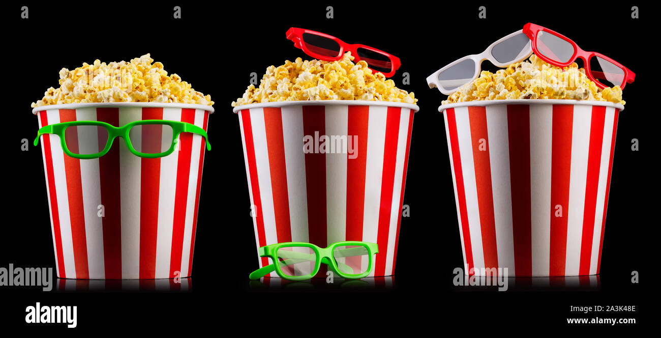Set of buckets with popcorn and 3D glasses isolated on black background Stock Photo - Alamy