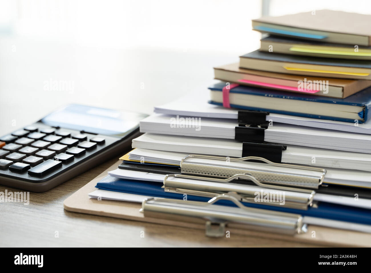 business man Office employee working contract with documents Stacks of ...