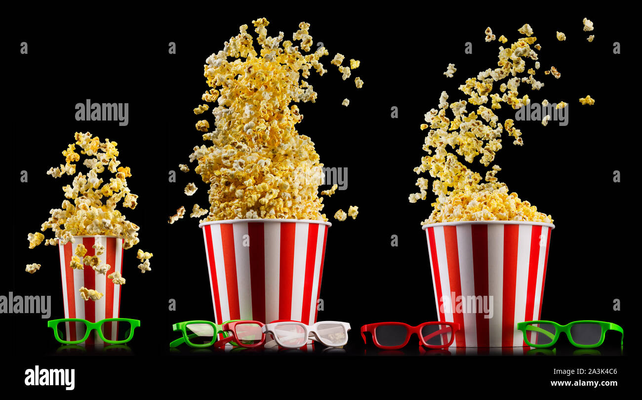 Set of buckets with popcorn and 3D glasses isolated on black background Stock Photo - Alamy