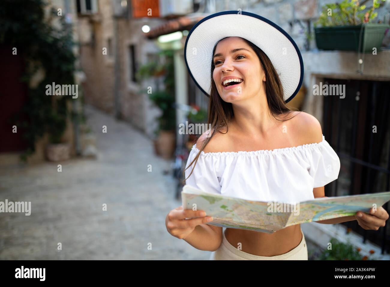 Beautiful girl traveling and having fun on summer vacation Stock Photo ...