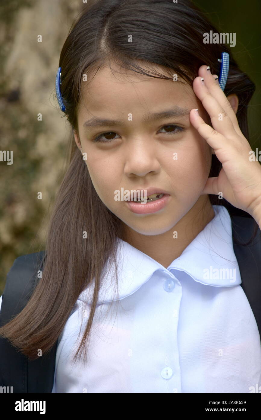 Child Girl Student Thinking With Books Stock Photo - Alamy