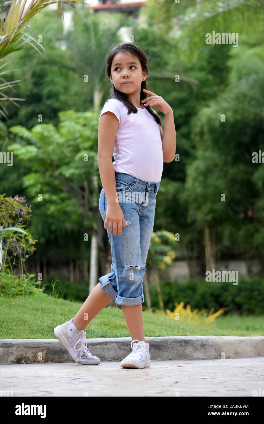 Girl child standing hi-res stock photography and images - Alamy