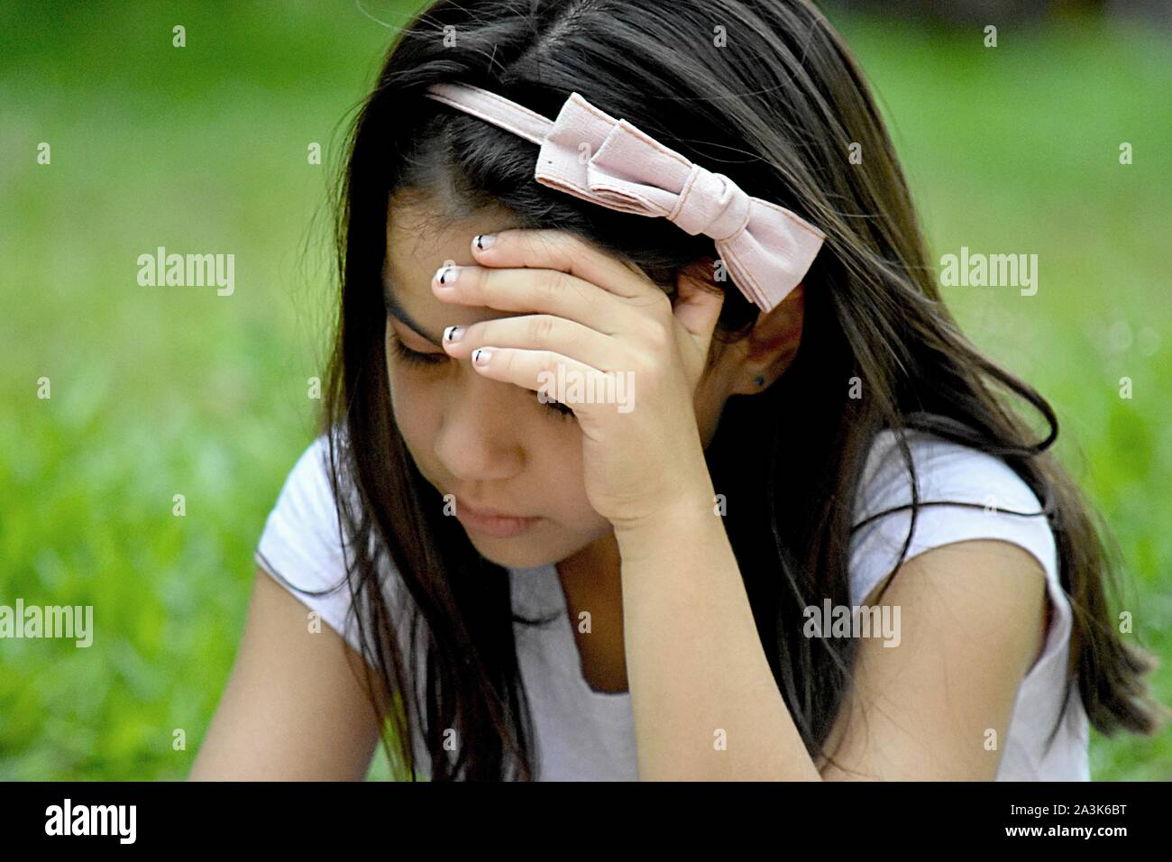 A Depressed Cute Minority Person Stock Photo - Alamy