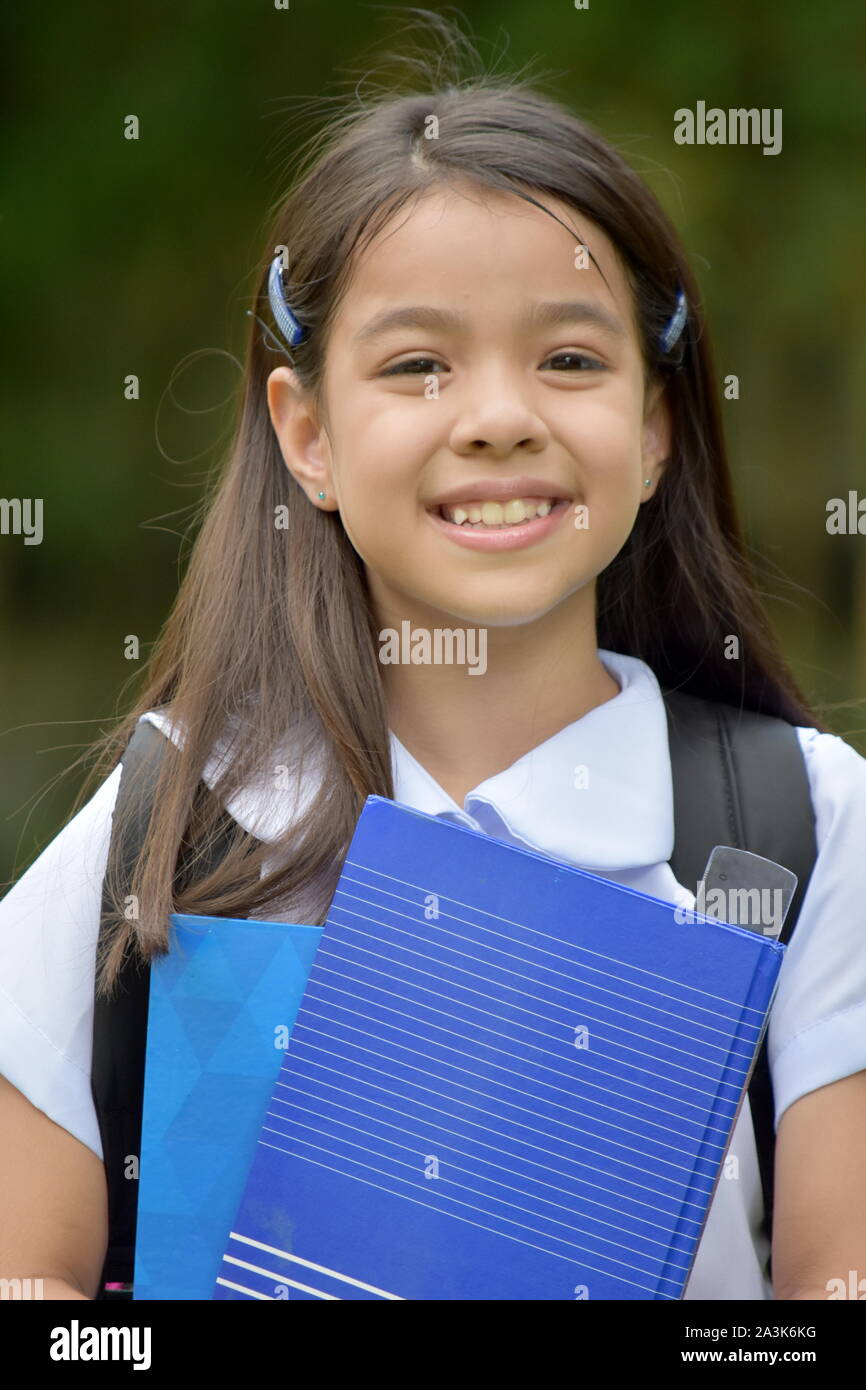 Smiling Prep Female Student Wearing School Uniform Stock Photo - Alamy