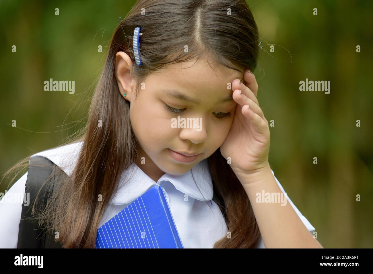 Female Student And Depression Wearing School Uniform Stock Photo - Alamy