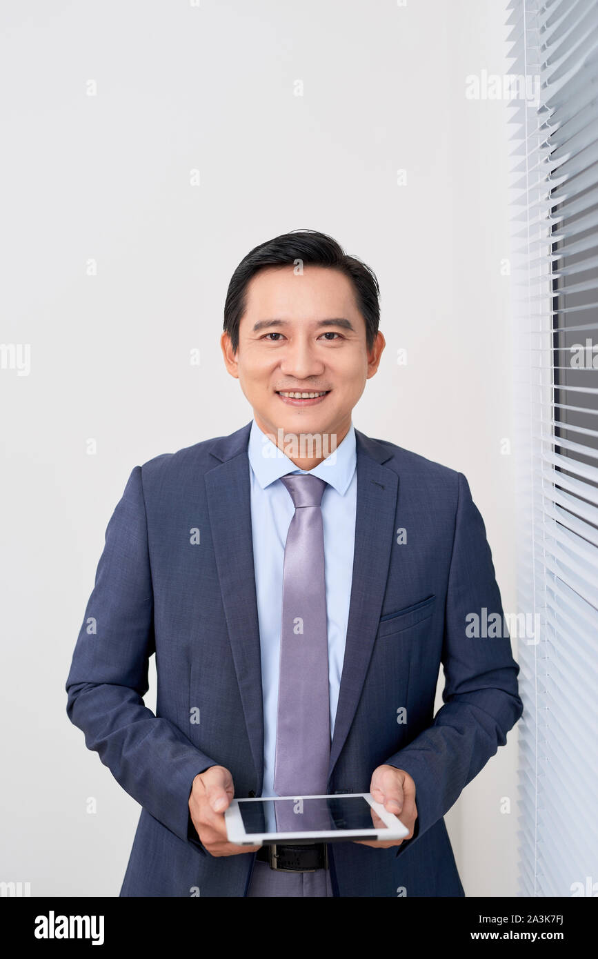 Product presentation. Promotion. Business man holding in hands tablet ...