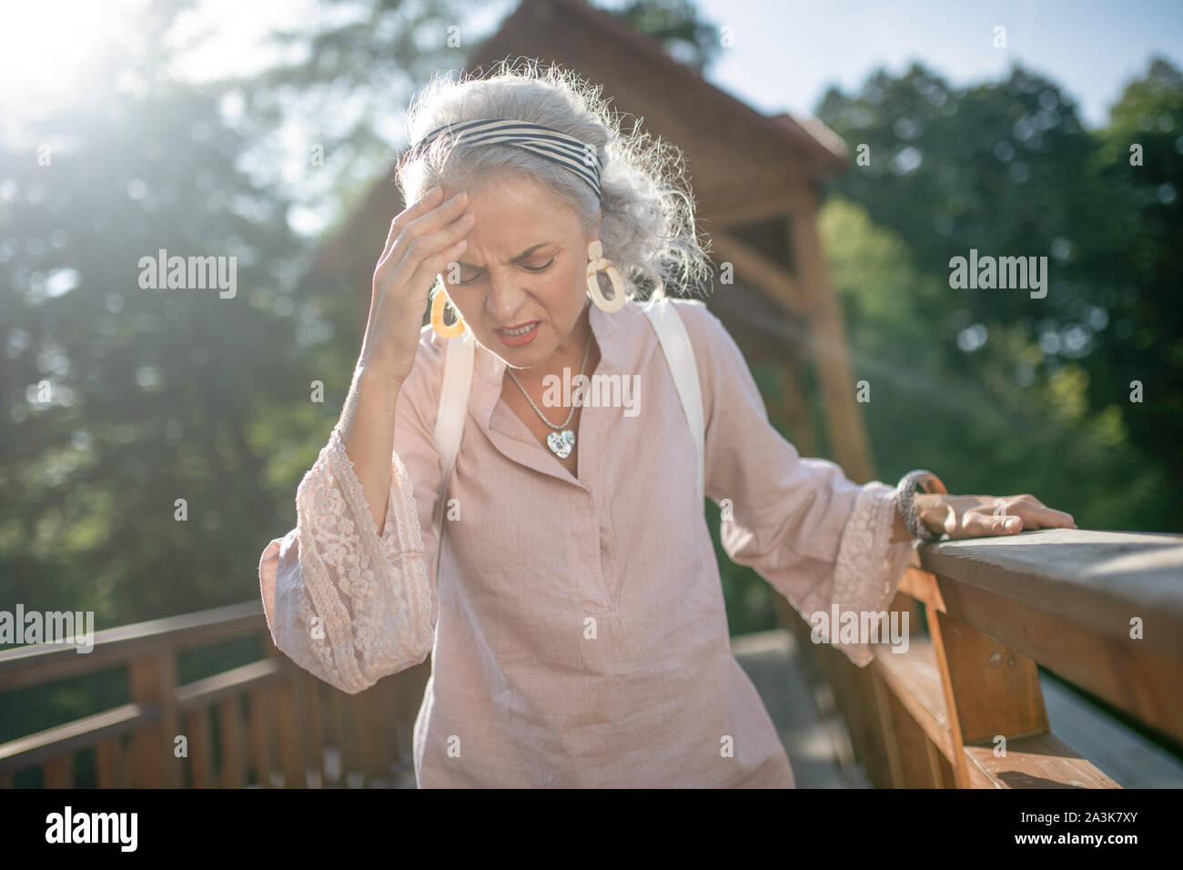 Woman headache summer hi-res stock photography and images - Alamy