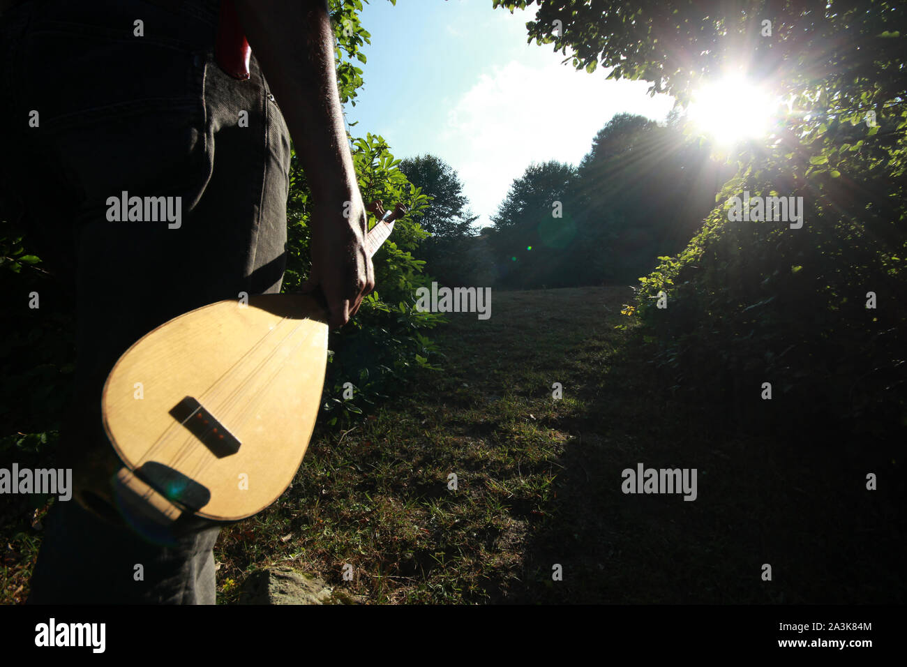 Playing baglama hi-res stock photography and images - Alamy