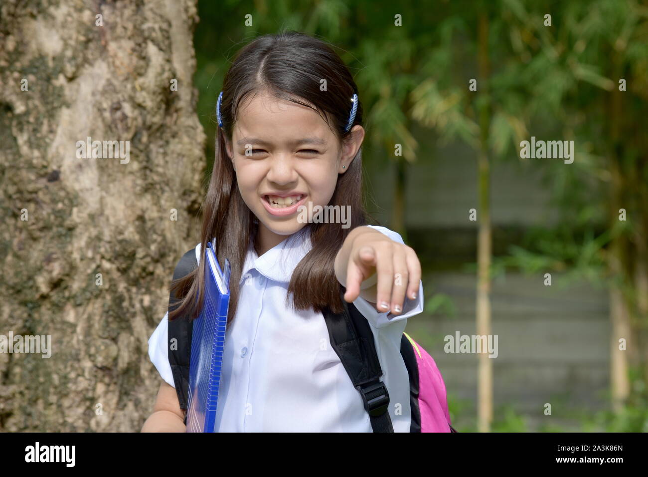 Female Student Pointing Stock Photo - Alamy